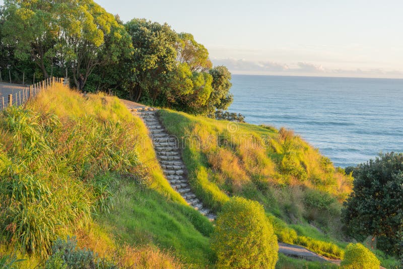 Steps Leading Up Slope on Mount Maunganui with Ocean Background Stock ...
