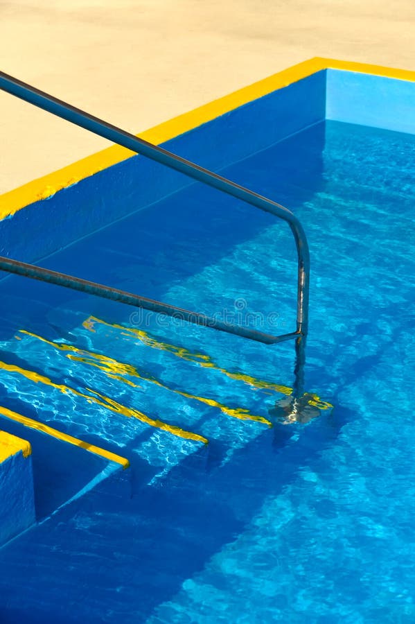 Steps into a swimming pool stock photo. Image of edge - 15190268