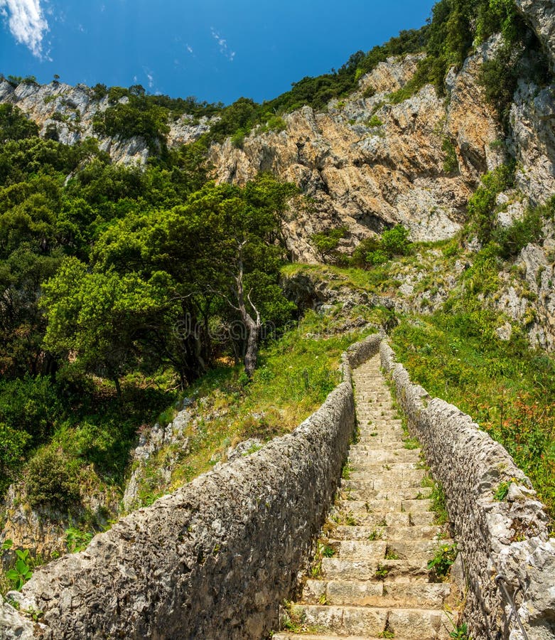 Steps To the Cliff, Bottom View Under Blue Sky Stock Image - Image of ...