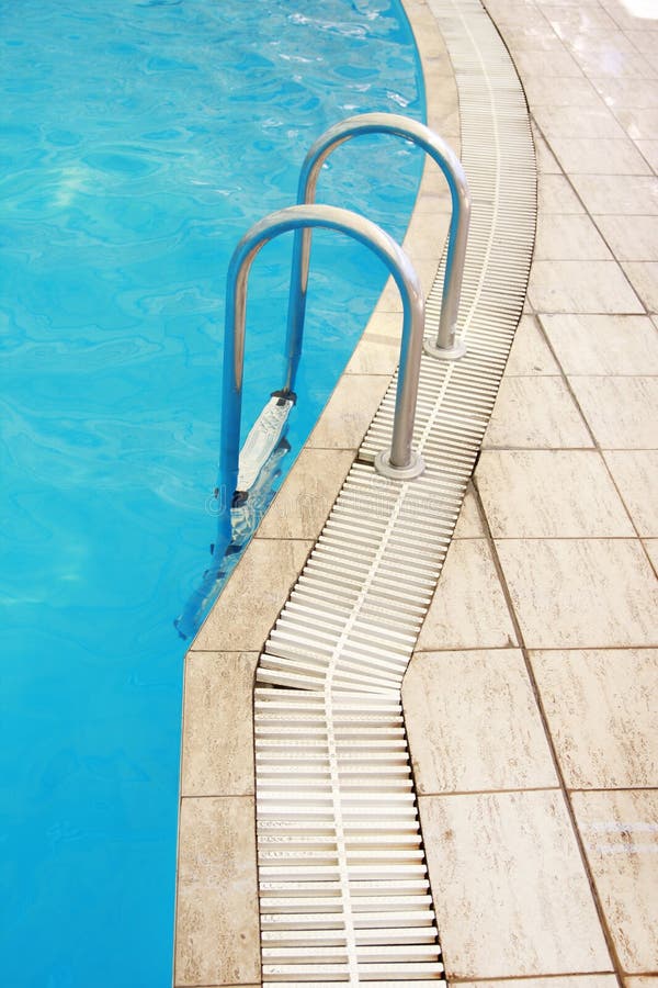 Steps in a water pool stock photo. Image of handrail - 39353682