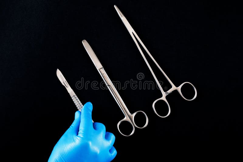 Sterile Instruments on a Green Background Close-up. Preparing ...