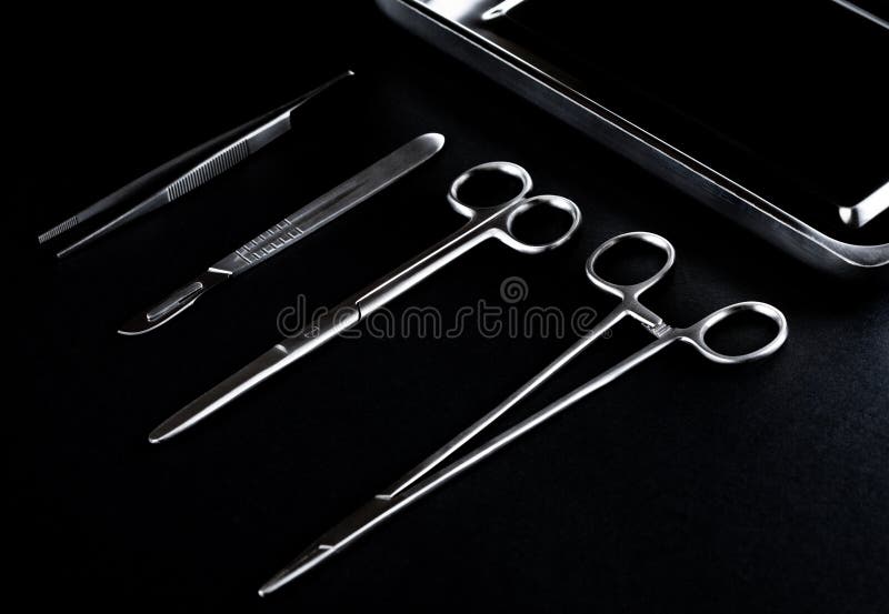 Sterile Instruments on a Green Background Close-up. Preparing ...