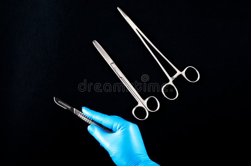 Sterile Instruments on a Green Background Close-up. Preparing ...