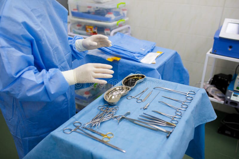 Sterile Instruments for Surgery on the Tray and Hands Stock Image ...