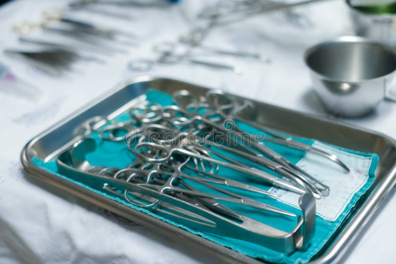 Sterile Surgical Instruments are on a Table during an Operation. Stock ...