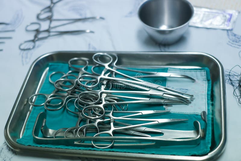 Sterile Surgical Instruments are on a Table during an Operation. Stock ...