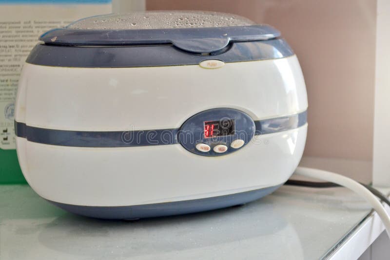 A Sterilizer or Disinfection Machine in a Liquid Solution in a Beauty ...