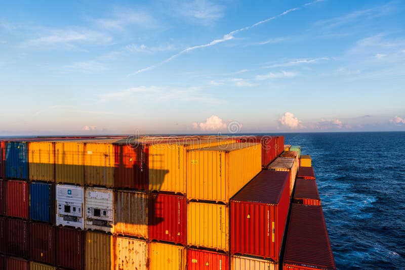 The Stern of the Cargo Ship Stacked High with Containers. Stock Image ...