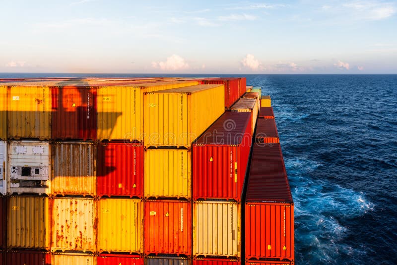 The Stern of the Cargo Ship Stacked High with Containers. Stock Photo ...