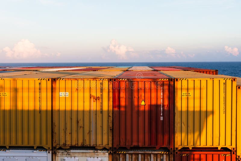 The Stern of the Cargo Ship Stacked High with Containers. Stock Image ...