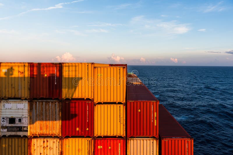 The Stern of the Cargo Ship Stacked High with Containers. Stock Image ...