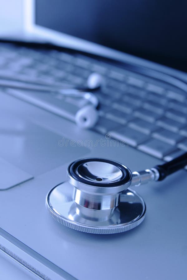 Laptop and Stethoscope on Light Grey Table, Space for Text. Concept of ...