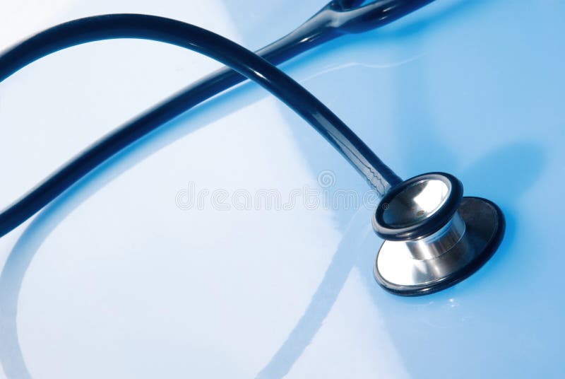 Stethoscope on Blue Background Stock Photo - Image of treatment, cure ...