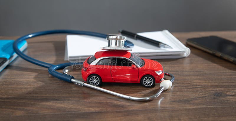Stethoscope and Car Model on the Table Stock Photo - Image of health ...