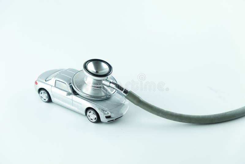 Stethoscope Checking Up the Car on White Background, Concept of Stock ...