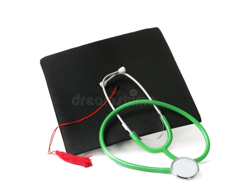Graduation Hat and Stethoscope on Grey Table, Closeup View with Space ...