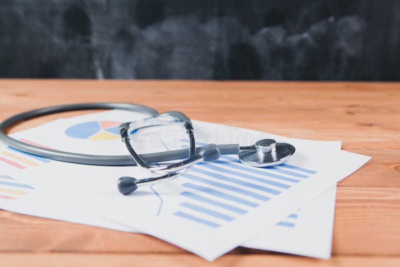 Stethoscope on a Graphic Charts Stock Photo - Image of diagram ...