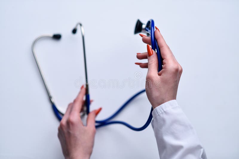 A stethoscope in the hands stock photo. Image of physician - 107696824