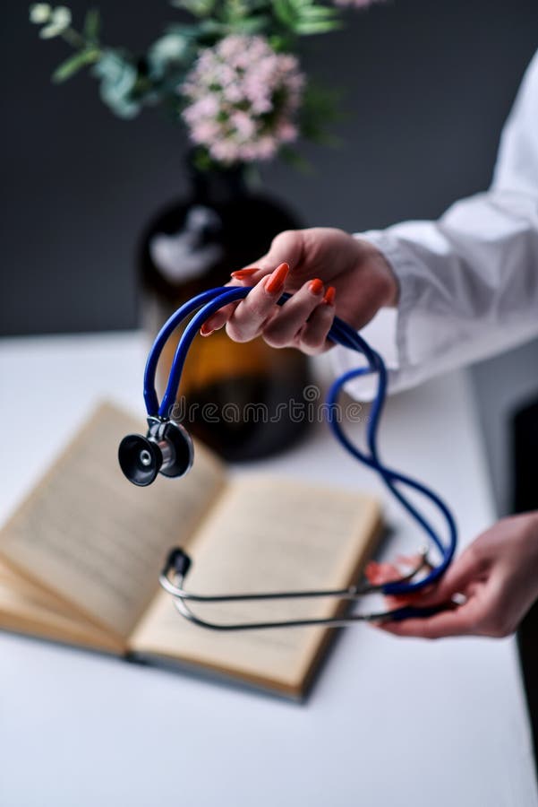 A stethoscope in the hands stock image. Image of hand - 101200717