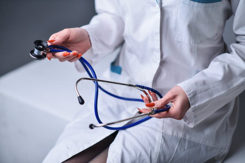 A stethoscope in the hands stock photo. Image of healthcare - 101894896