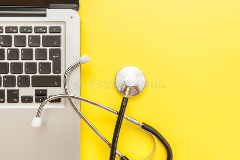 Stethoscope Keyboard Laptop Computer Isolated on Yellow Background ...