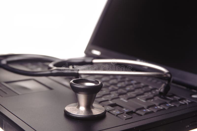 Doctor Working with Laptop Computer in Medical Workspace Office. Focus ...