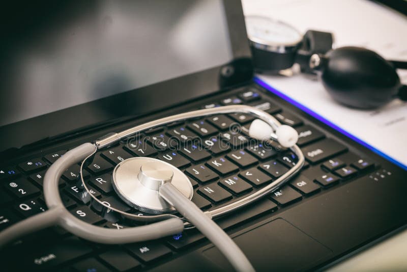 Stethoscope on a laptop stock photo. Image of health - 82789638