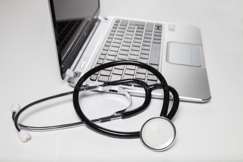 Stethoscope and laptop stock photo. Image of profession - 42073158