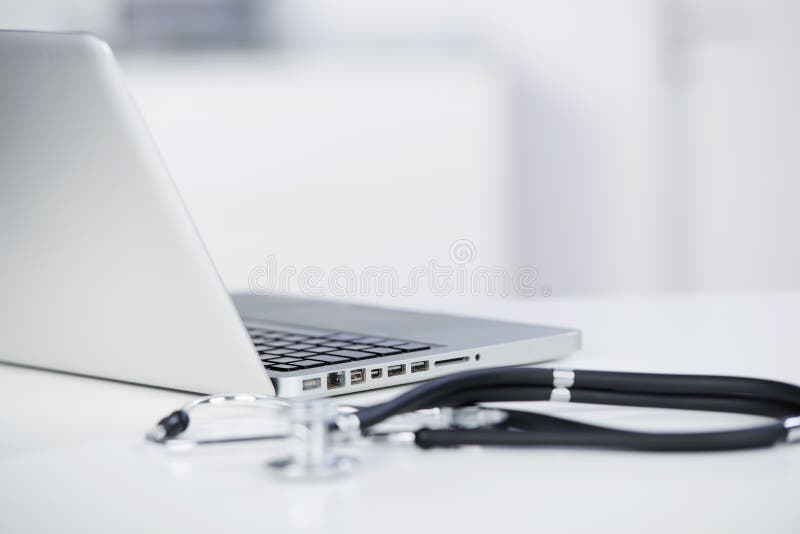 Laptop and Stethoscope on Light Grey Table, Space for Text. Concept of ...