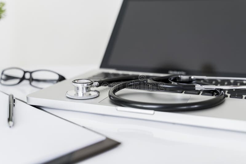 Stethoscope on Laptop on Doctor Desk in Office Stock Image - Image of ...