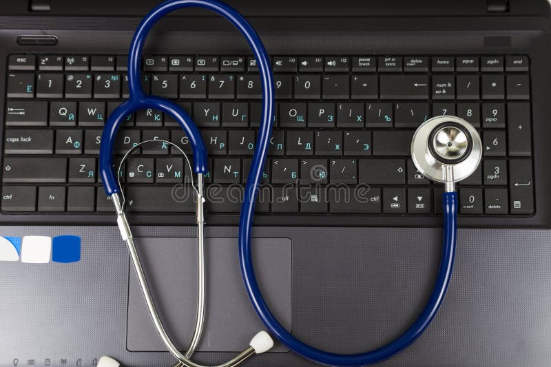 Stethoscope on a laptop stock photo. Image of internet - 92460710