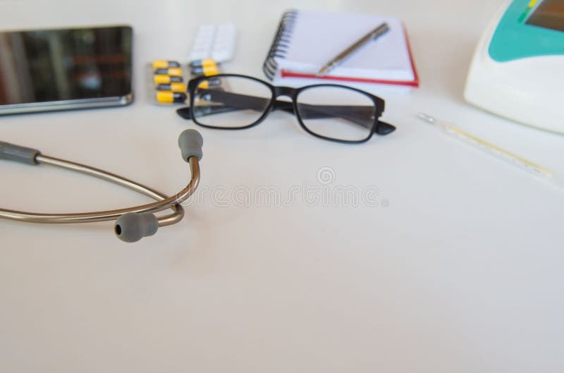 Stethoscope and Medical Equipment. Doctor Workplace in Office . Stock ...