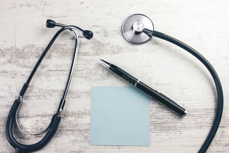 Stethoscope and Note with Pens on the Table Stock Photo - Image of note ...