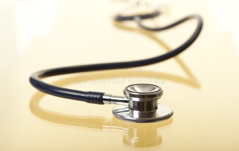 Stethoscope with Reflection on Gold Stock Image - Image of medicine ...