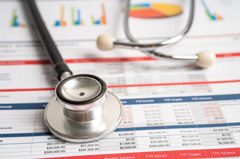 Stethoscope on Spreadsheet and Graph Paper, Finance, Account ... Stethoscope on Spreadsheet and Graph Paper, Finance, Account ...
