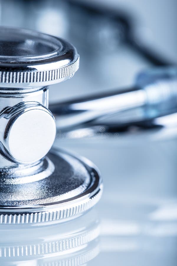 Stethoscope on a Heart Monitor Printout.Electrocardiogram Chart and ...