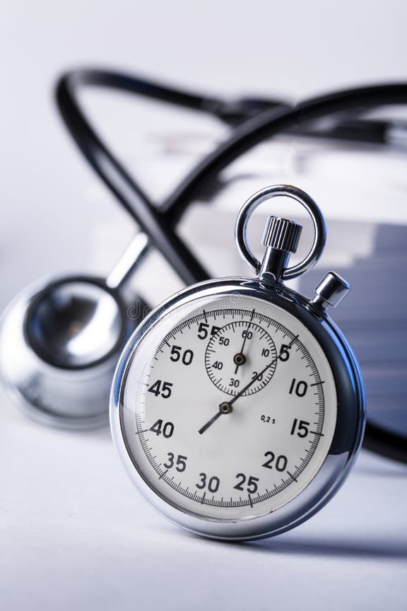 Stethoscope and stopwatch stock image. Image of heap - 26682071