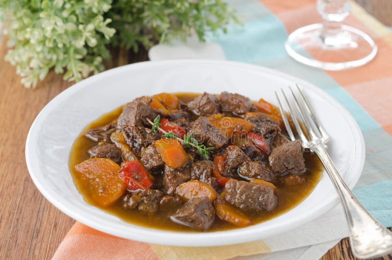 Stew of Beef with Vegetables and Prunes in a Plate Stock Photo - Image ...