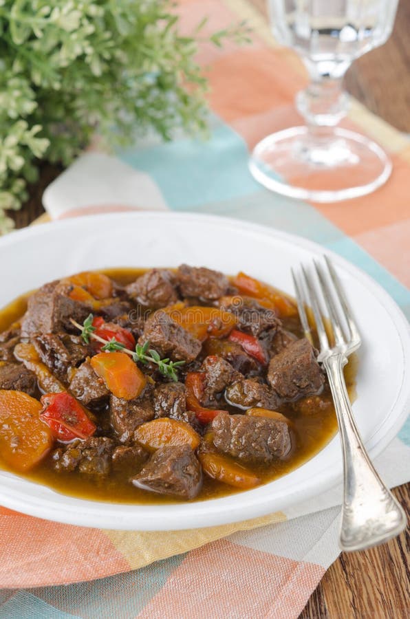 Stew Of Beef With Vegetables And Prunes In A Plate, Vertical Picture ...
