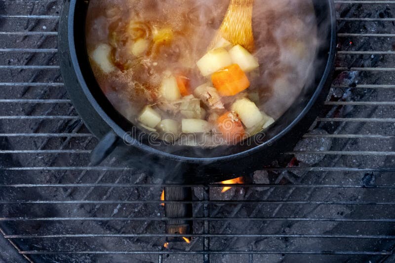 Stew Cooked on Fire Outdoors in a Cast-iron Pot Stock Image - Image of ...
