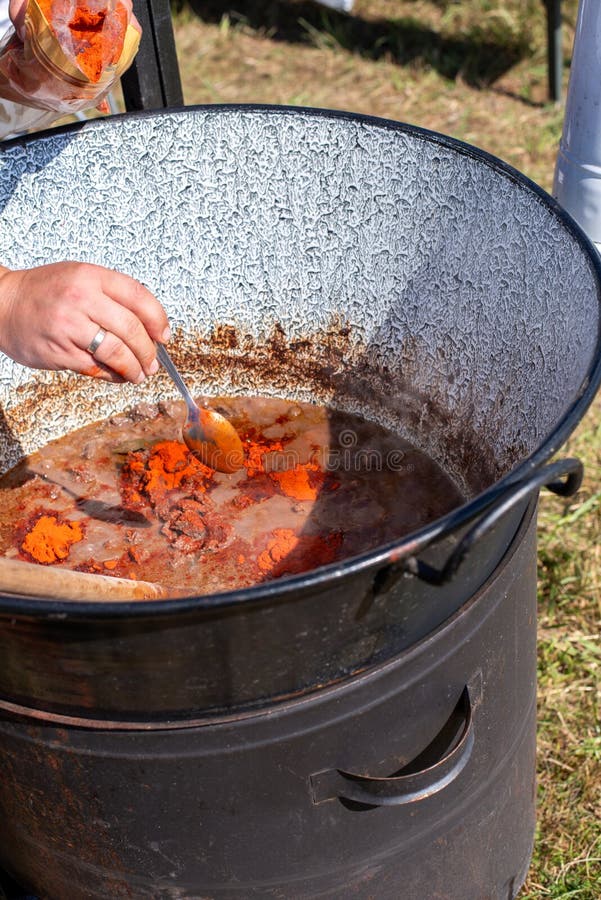 Stew Cooking in a Cauldron, Cooking Goulash in a Cauldron Stock Photo ...