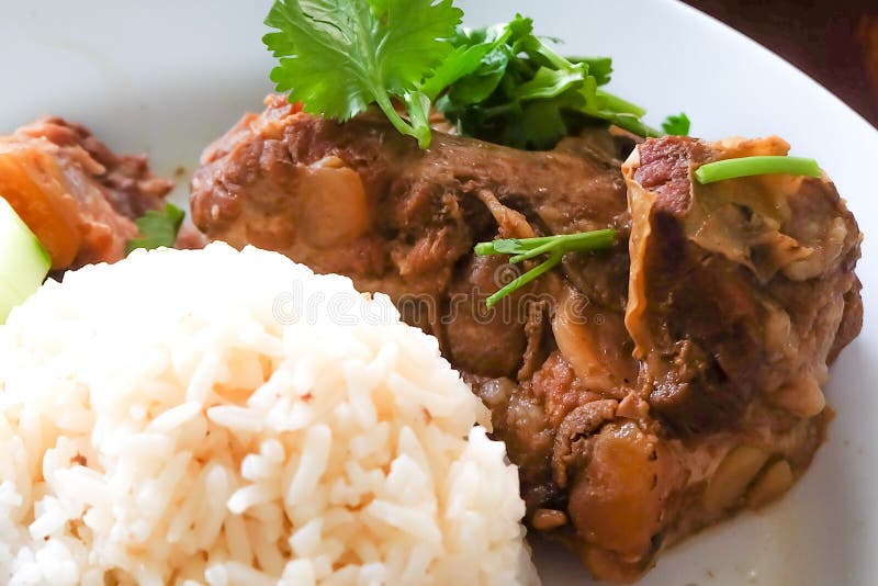 Stew ribs with rice served stock photo. Image of broth - 98279764