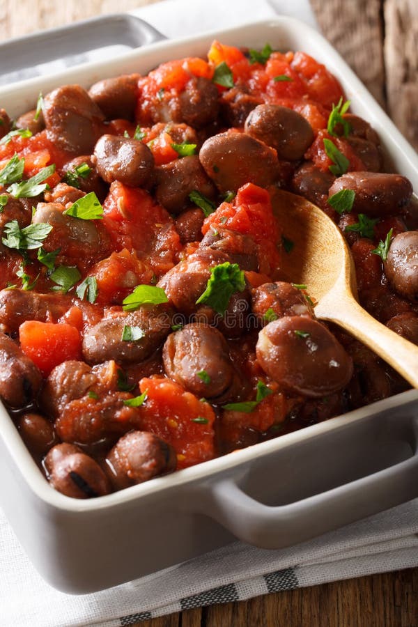 Stew Spicy Broad Beans with Tomatoes and Herbs Closeup. Vertical Stock ...
