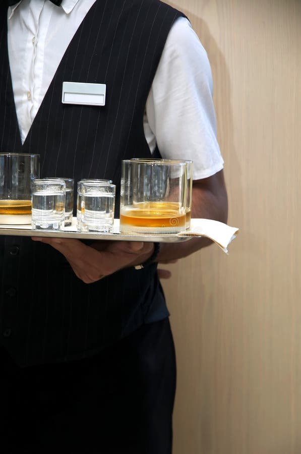 Steward in hotel stock image. Image of glass, wait, drinks - 1206005