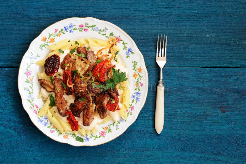 Stewed Beef Meat with Bechamel Sauce and Penne Pasta Stock Image ...