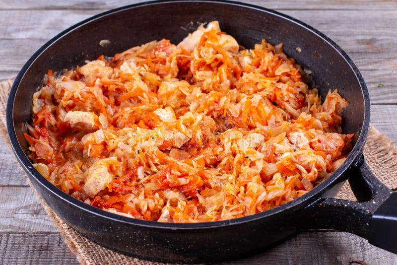Stewed cabbage in a pan stock photo. Image of organic - 168918884