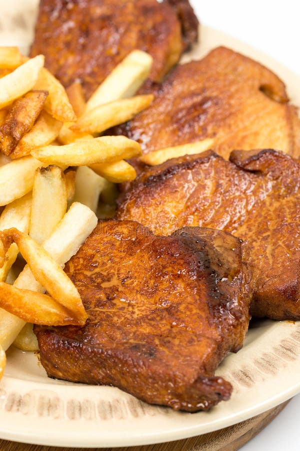 Stewed Pork Chops with French Fries on the Plate Stock Image - Image of ...