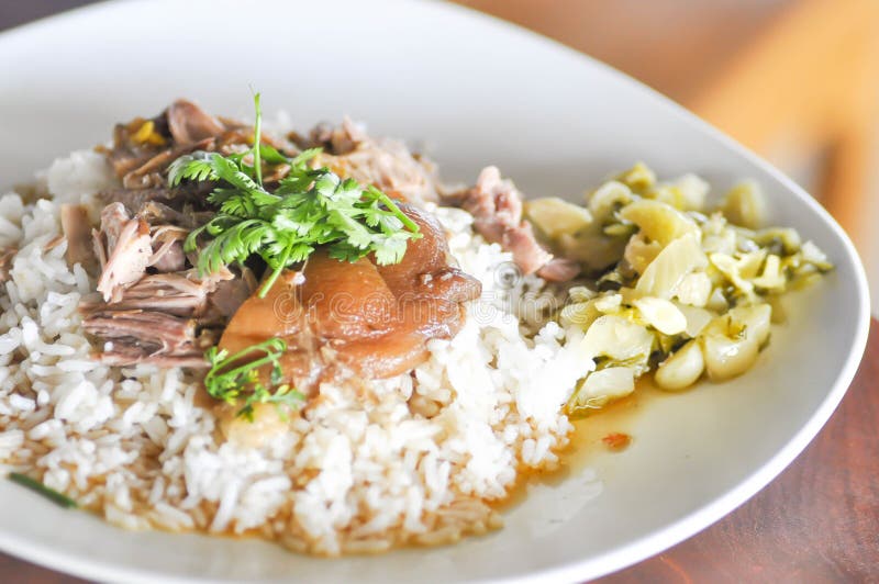 Stewed pork leg on rice stock photo. Image of ingredient - 74761474