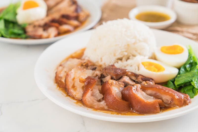 Stewed pork leg with rice stock image. Image of garlic - 107215845