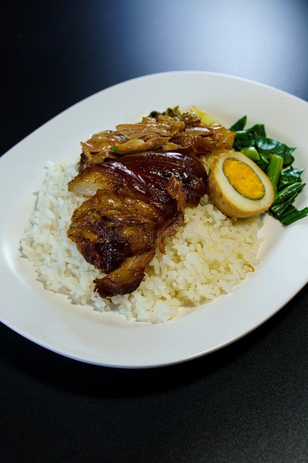 Stewed Pork Legs with Rice and Boiled Egg Stock Photo - Image of field ...